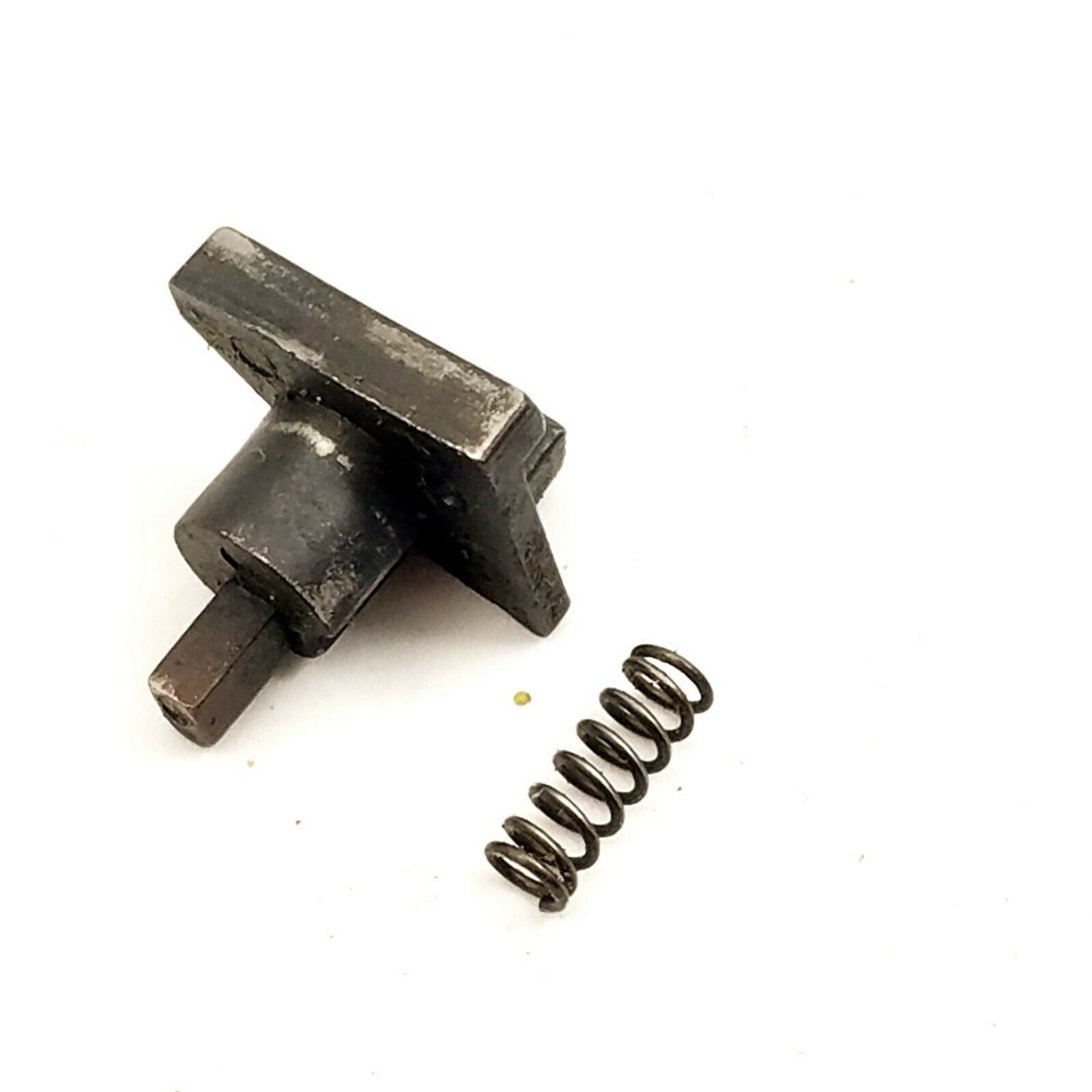 Bryco Jennings Nine, 9mm Pistol Part. Disassembly Button & Spring - Postrock Gun Parts