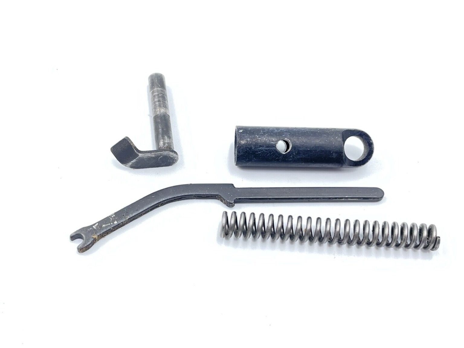 Ruger P85 9mm pistol parts, hammer pivot, strut, spring, and seat ...